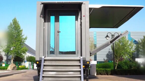 With the press of a button this tiny house folds into a box that you ...